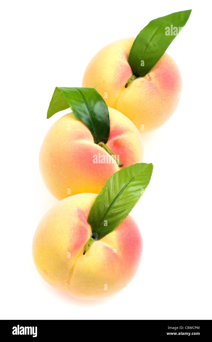 object on white - plastic peach close up Stock Photo - Alamy