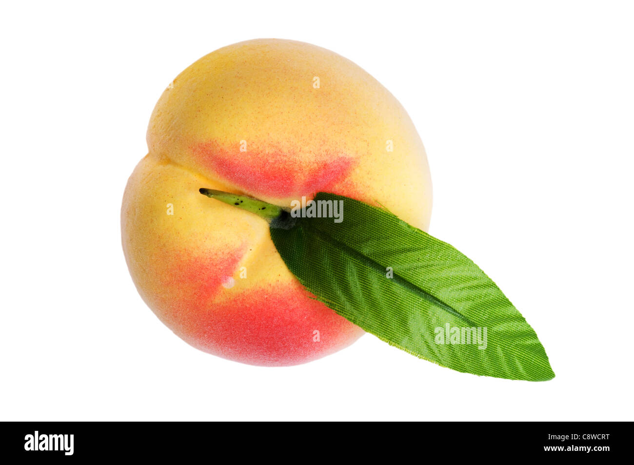 object on white - plastic peach close up Stock Photo - Alamy