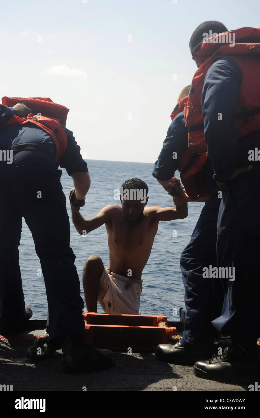 The first of three men that were rescued from the water of the Gulf of ...