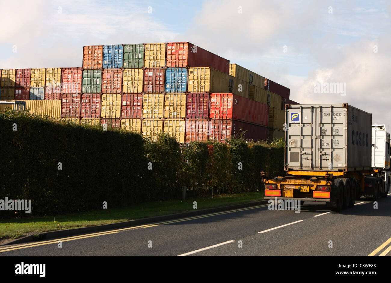 a container truck passing a container storage depot in Felixstowe ...
