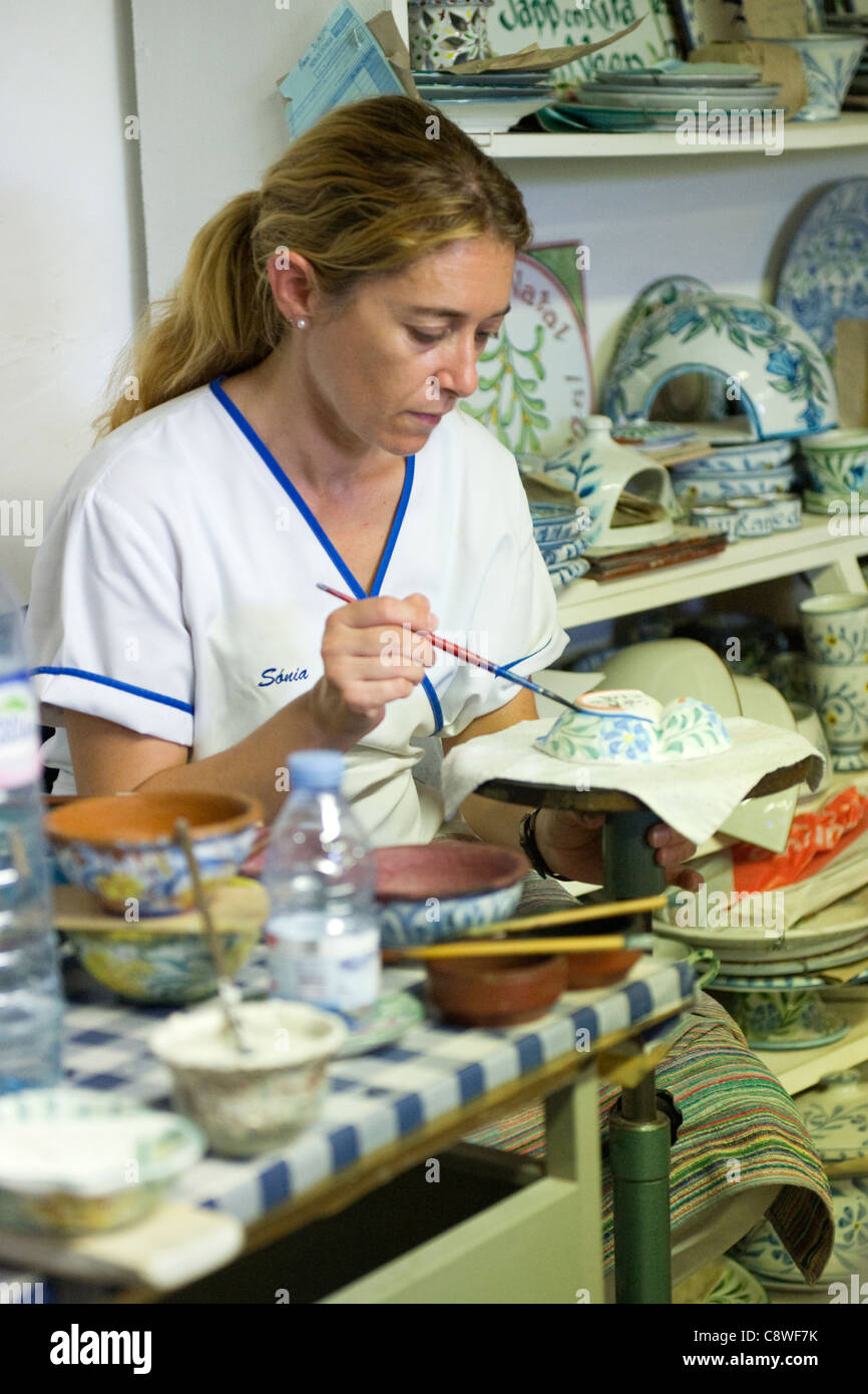 Portugal , Algarve , Olaria , Porches Pottery , attractive young blond ...