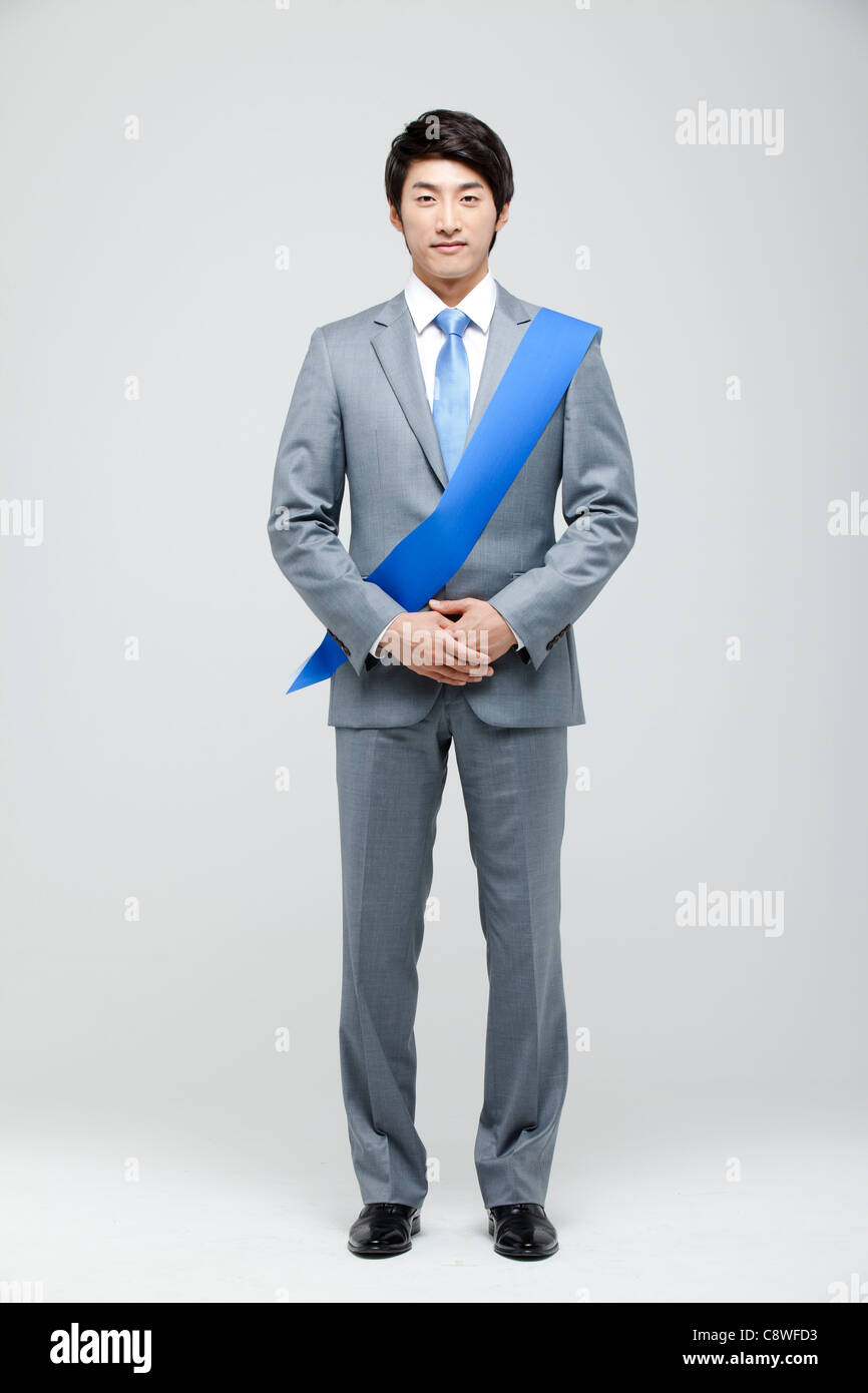 Standing man wearing sash hi-res stock photography and images - Alamy