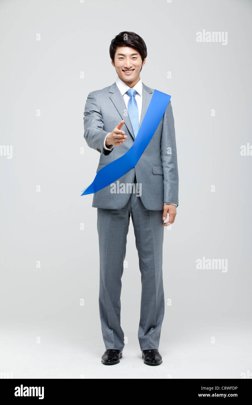 Businessman wearing suit extending hand hi-res stock photography and ...