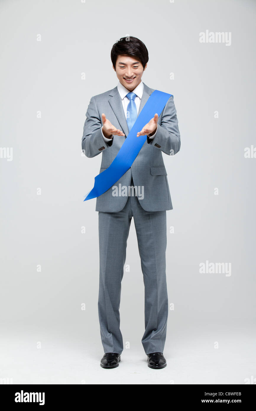 Standing man wearing sash hi-res stock photography and images - Alamy