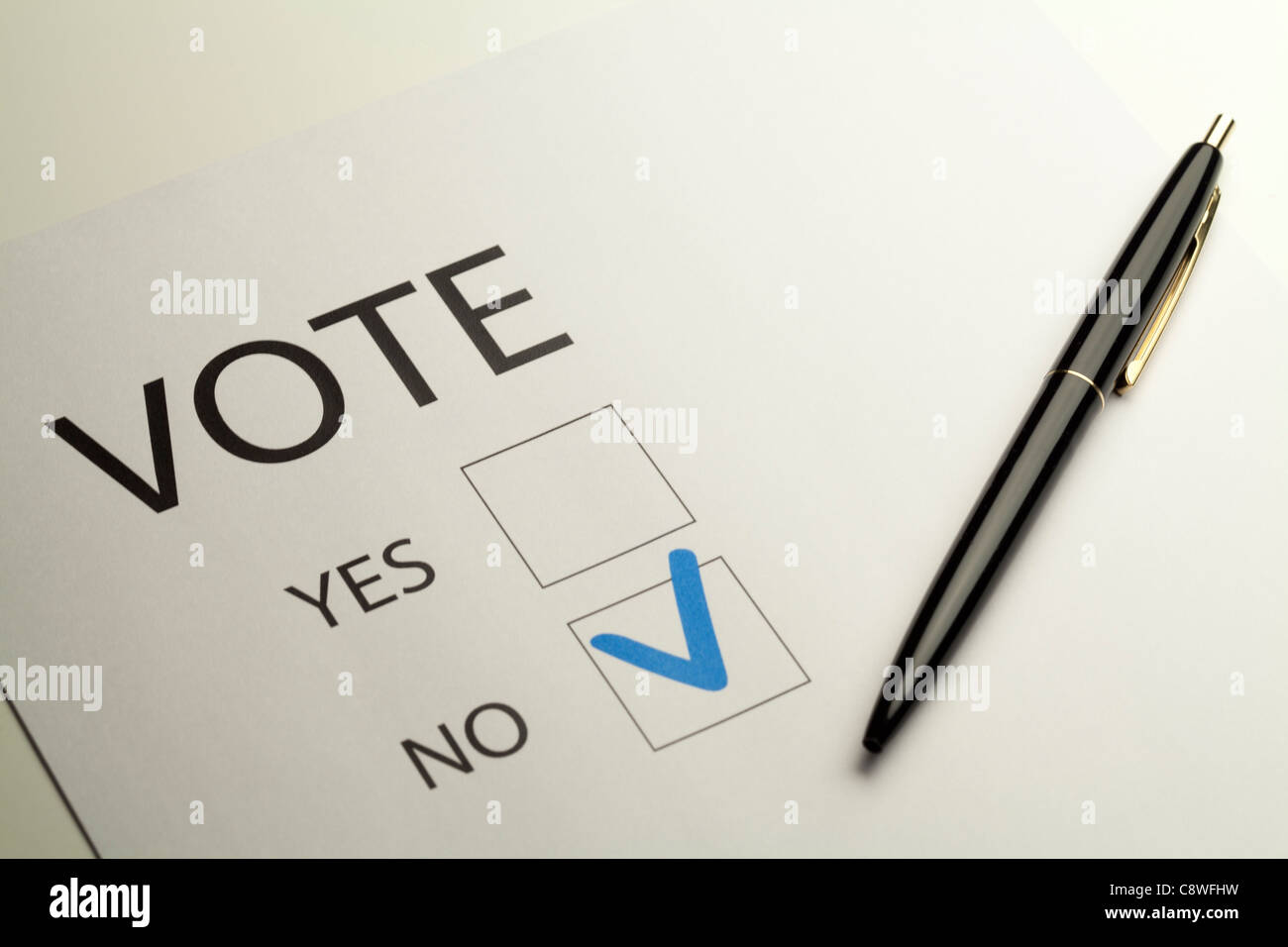 A Pen And Yes Tick In A Check Box On A Piece Of Paper Stock Photo - Alamy