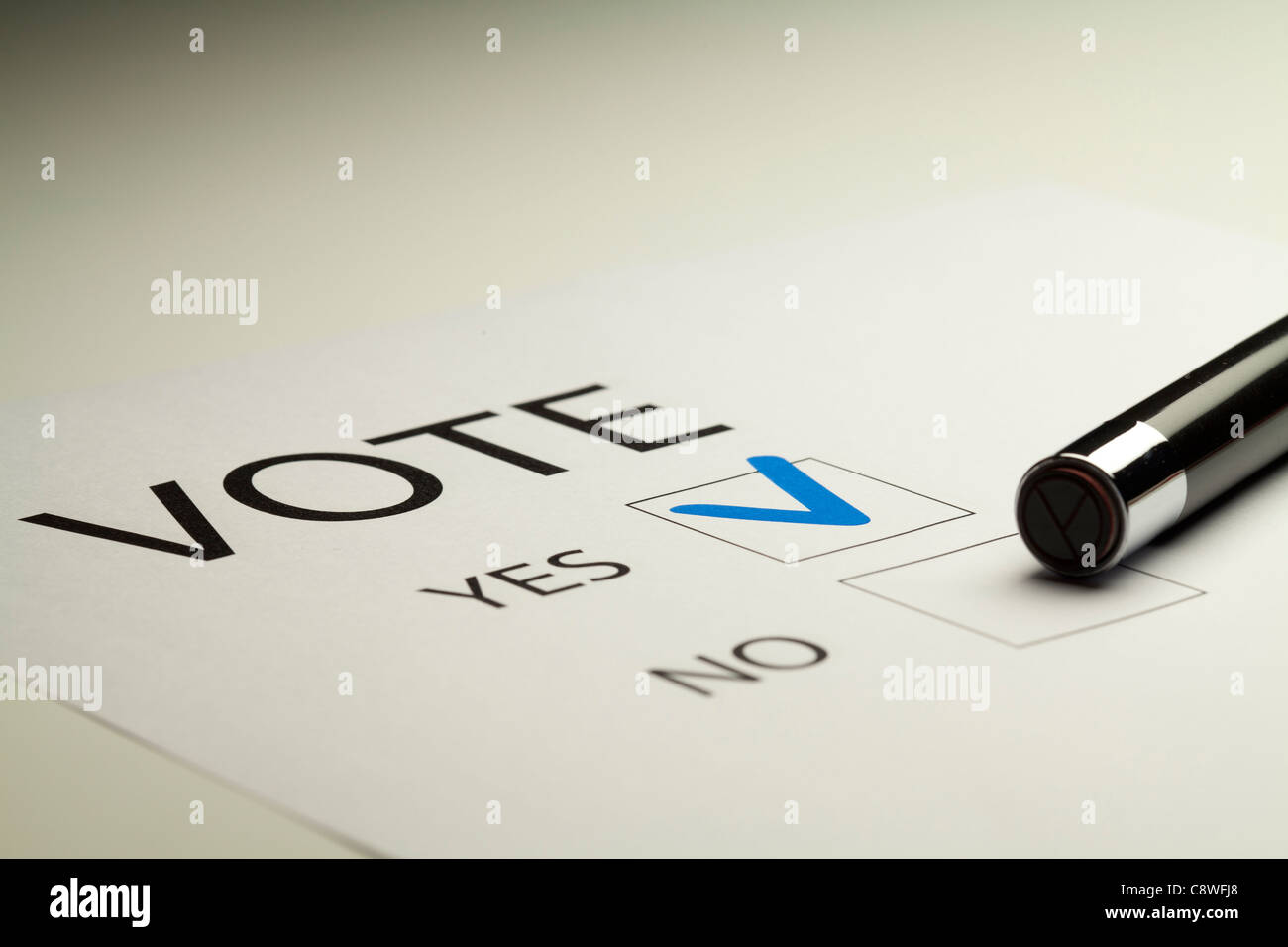 A Pen And Yes Tick In A Check Box On A Piece Of Paper Stock Photo - Alamy