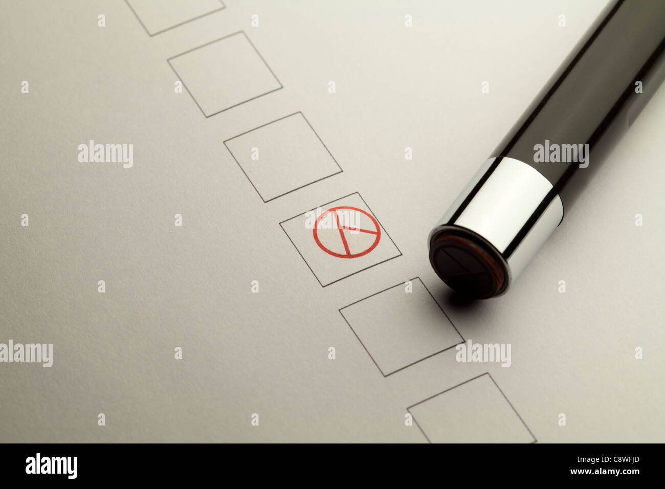 A Pen And Symbol In A Check Box On A Piece Of Paper Stock Photo - Alamy