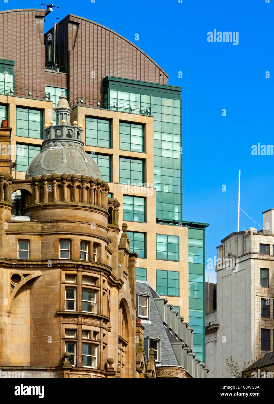 Victorian and modern buildings adjacent to each other in Manchester ...