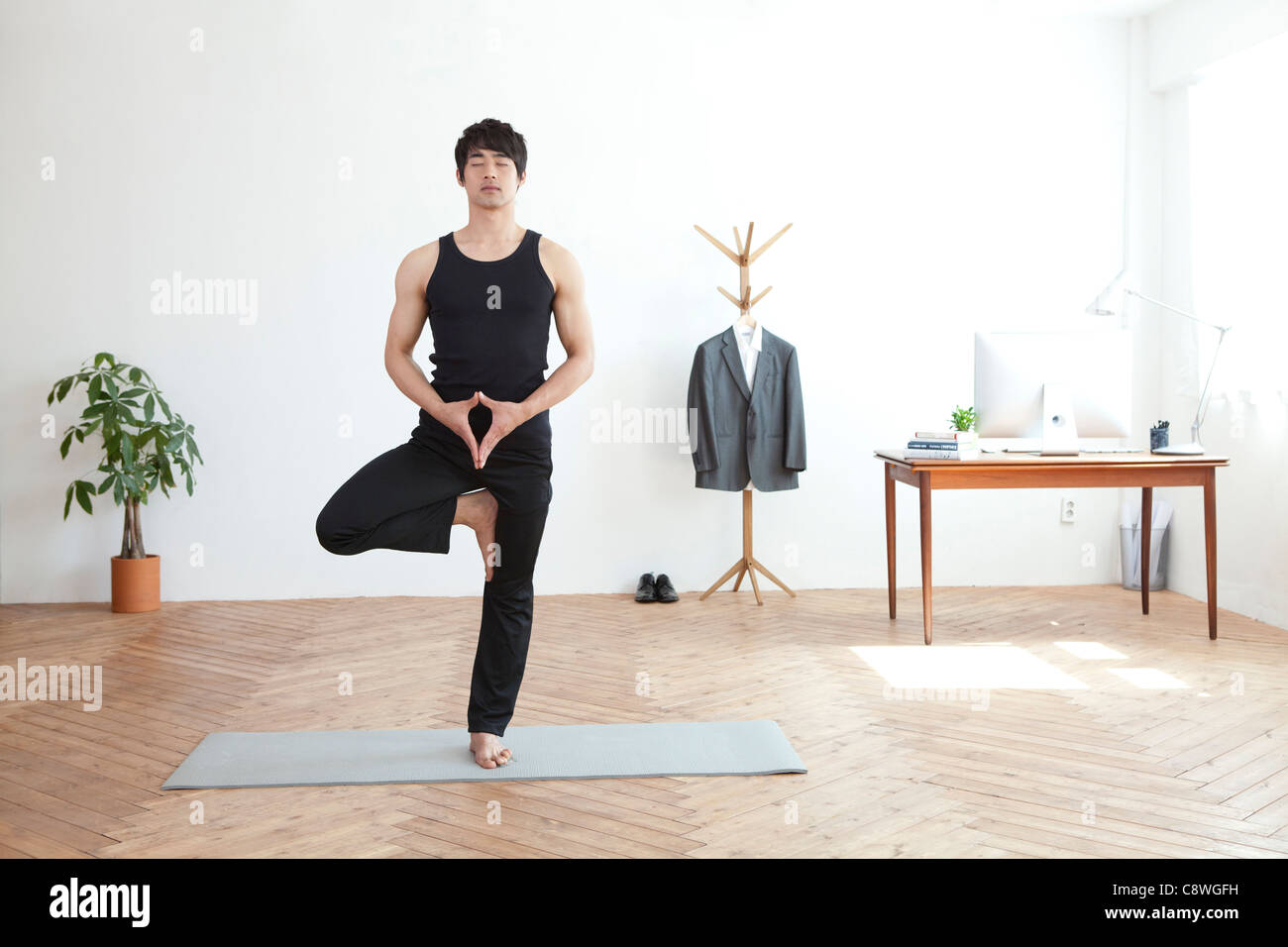 Asian Man Doing Exercise Stock Photo - Alamy