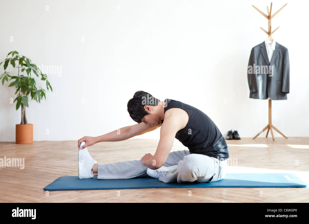 Asian Man Doing Exercise Stock Photo - Alamy