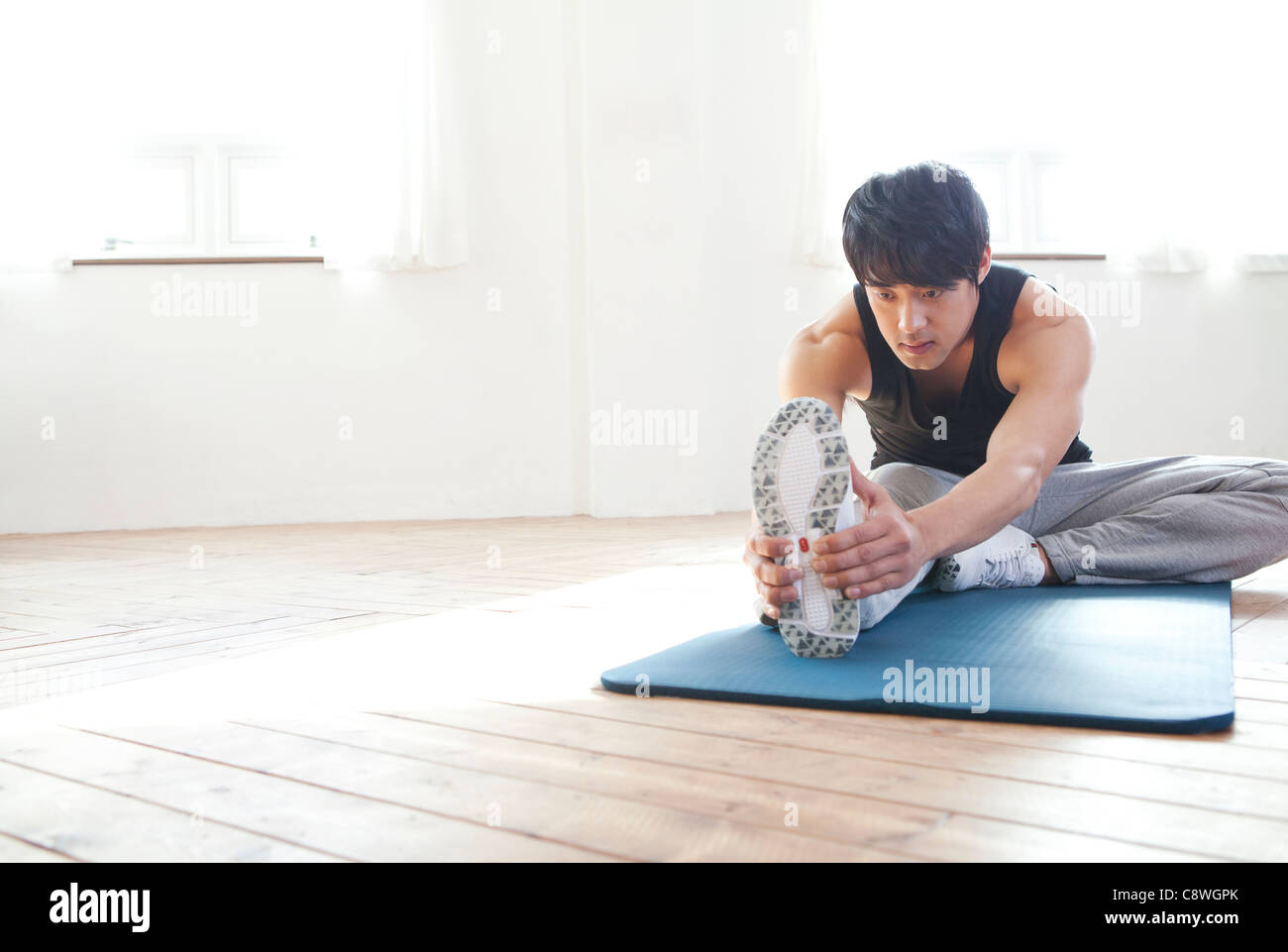 Asian Man Doing Exercise Stock Photo - Alamy