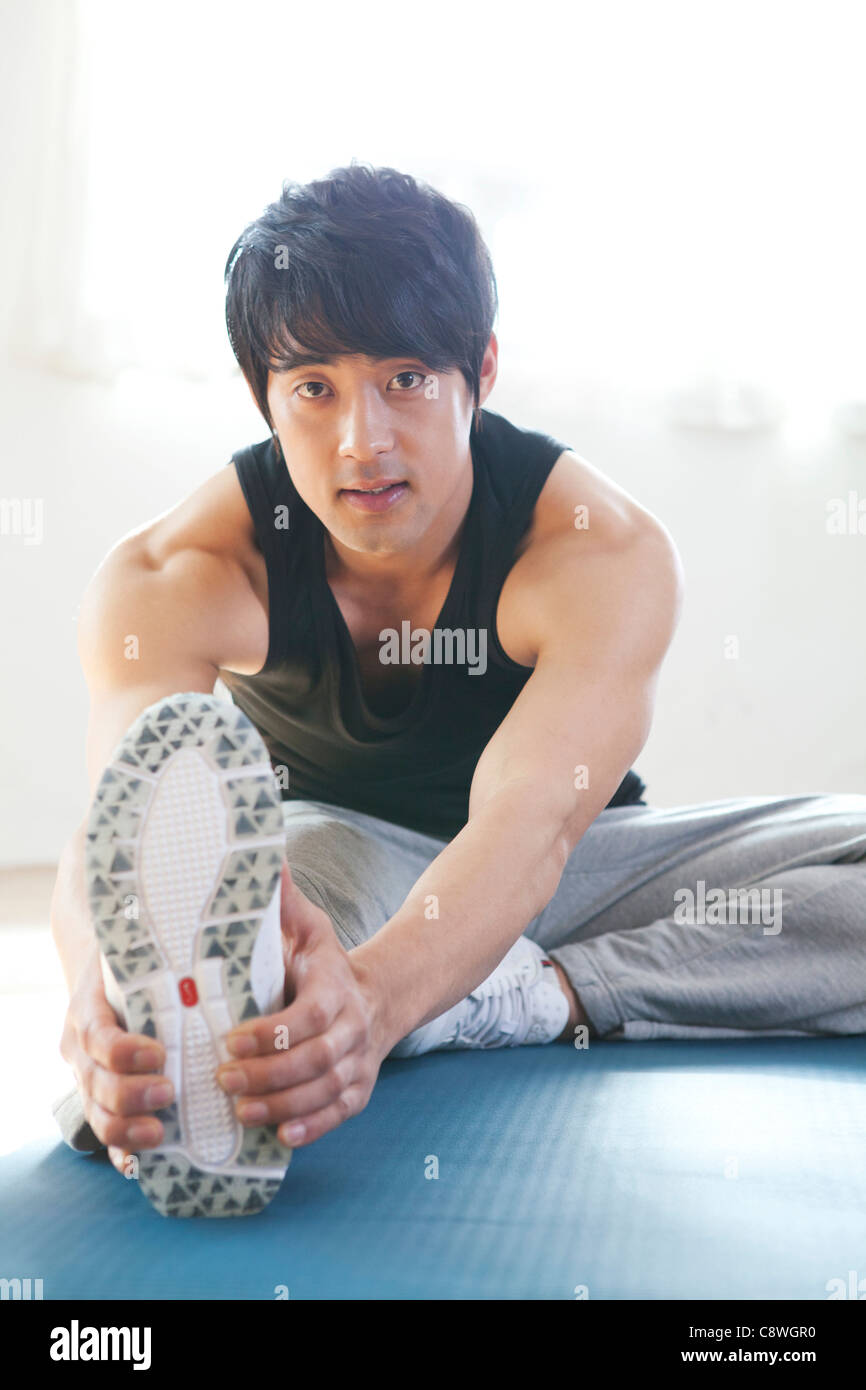 Asian Man Doing Exercise Stock Photo - Alamy