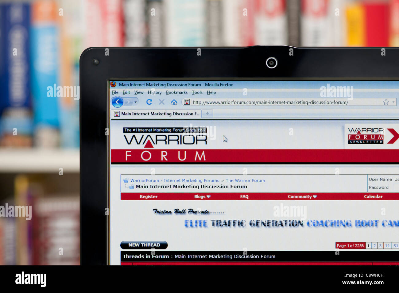 The Warrior Forum website shot against a bookcase background (Editorial ...