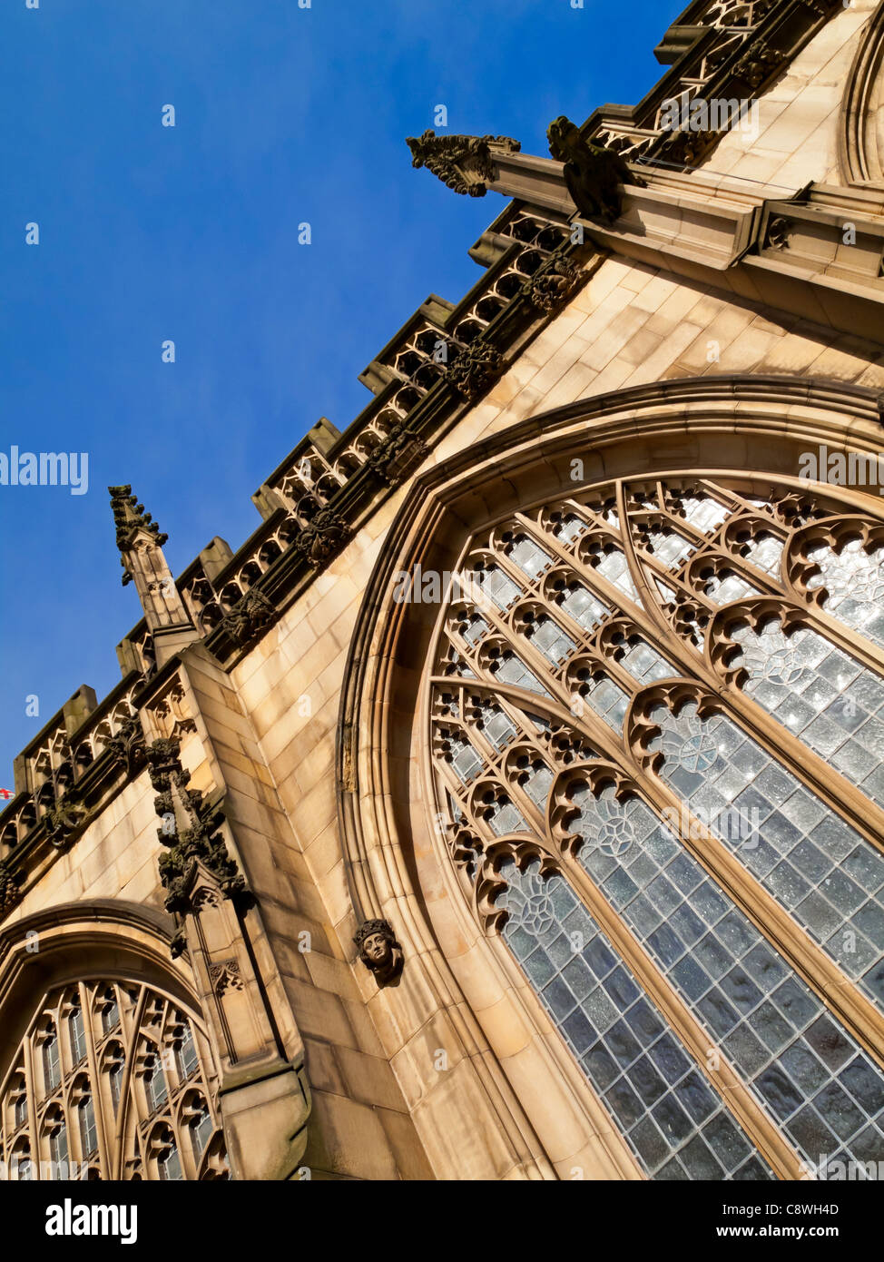 Arched windows in Manchester Cathedral on Victoria Street central ...