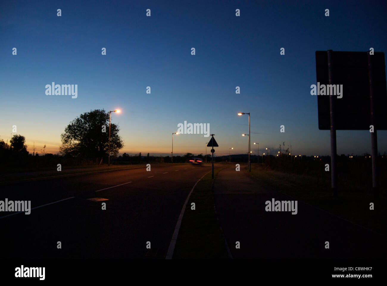 Urban view at night under streetlights Stock Photo - Alamy
