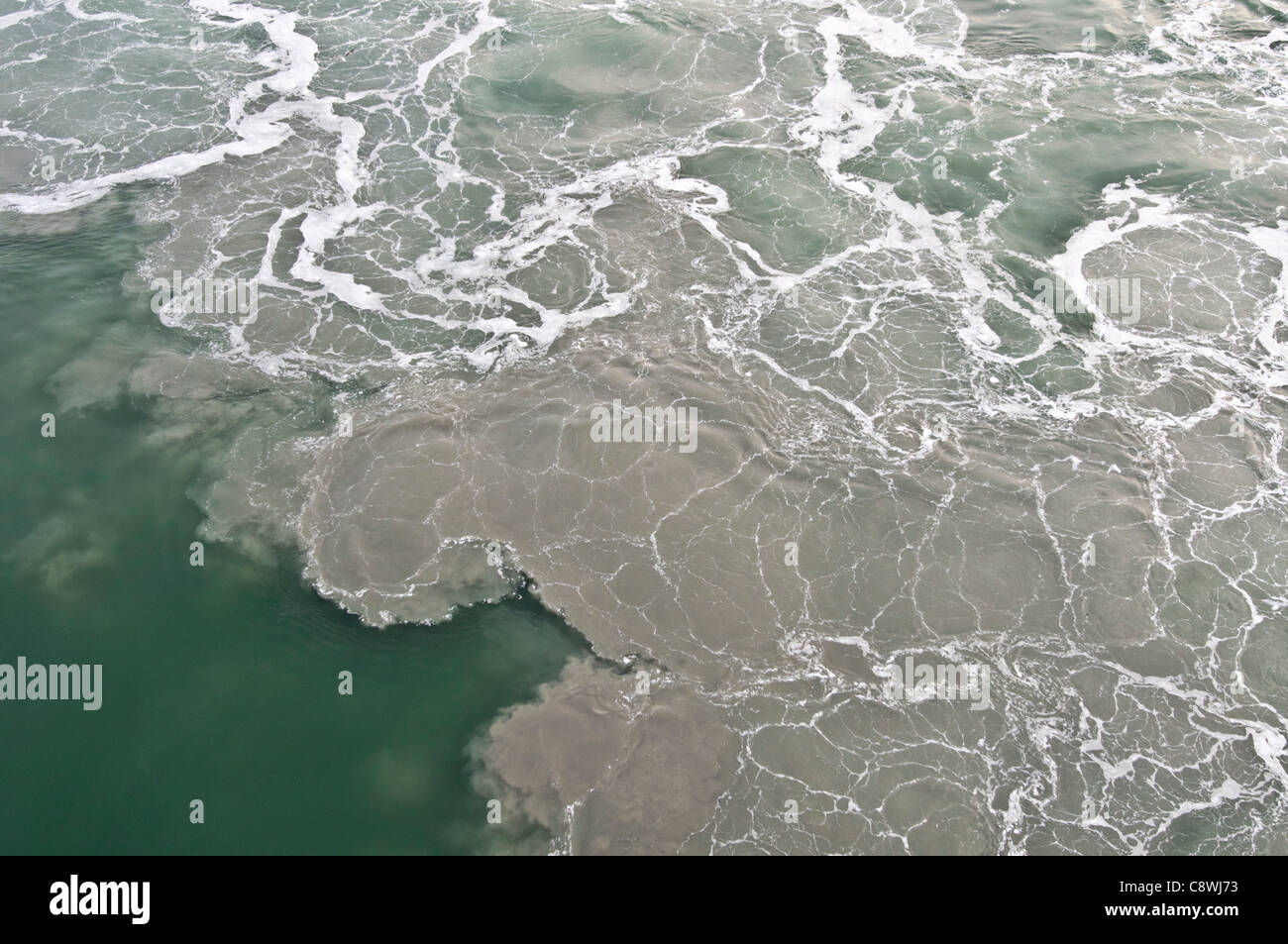 Venice - mud in the lagoon stirred up by a cruise ship departing Stock ...