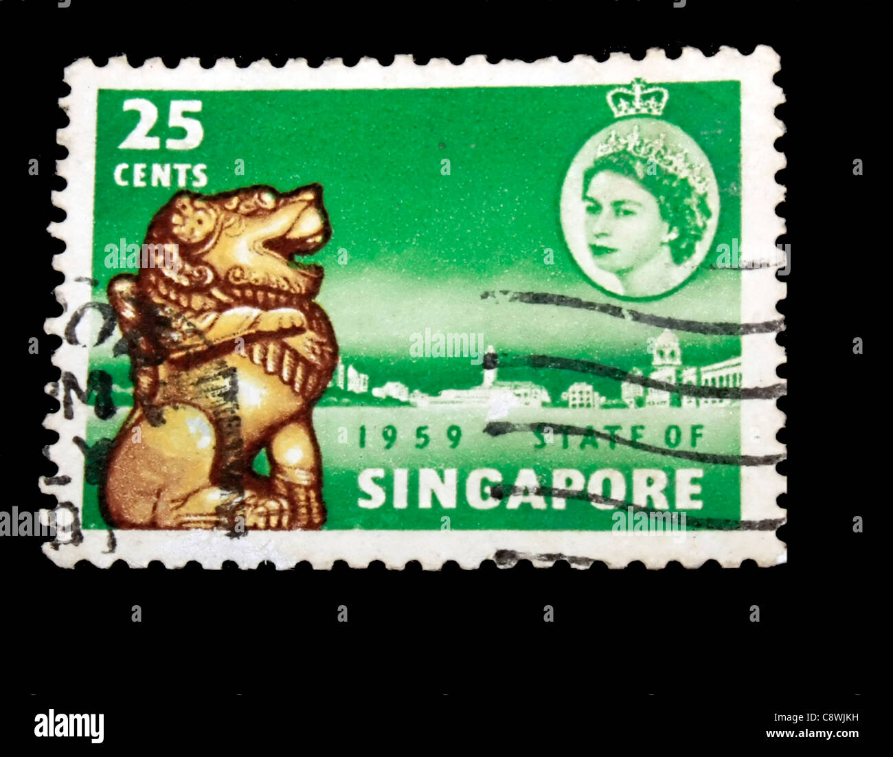 A postage stamp of Singapore in black background showing Merlion statue ...