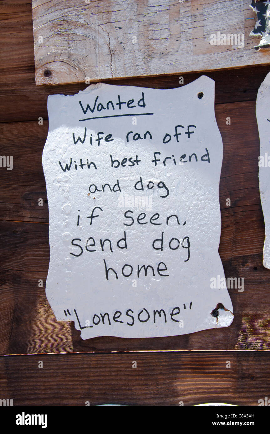 Funny advertising board Stock Photo - Alamy