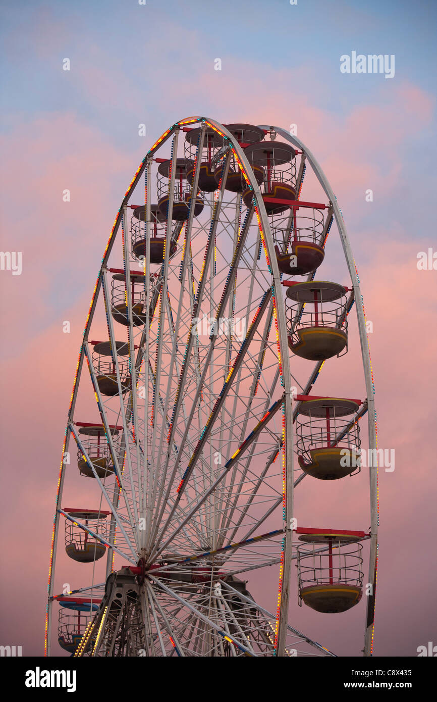 A ferris wheel on the South Pier at Blackpool at sunset Stock Photo - Alamy