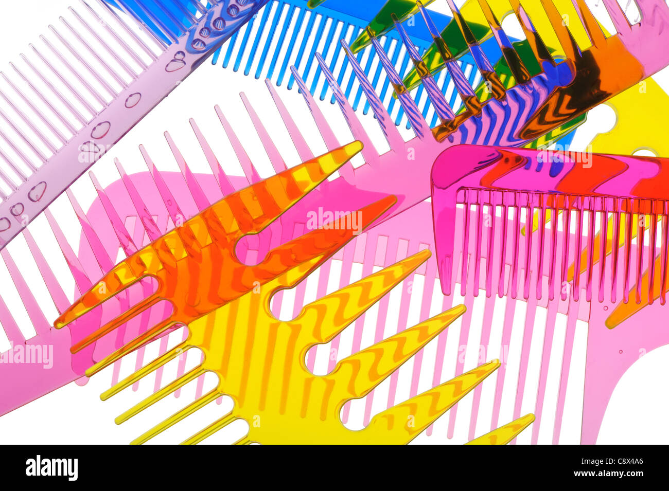 Set multi-coloured transparent combs. It is photographed on a gleam. It ...