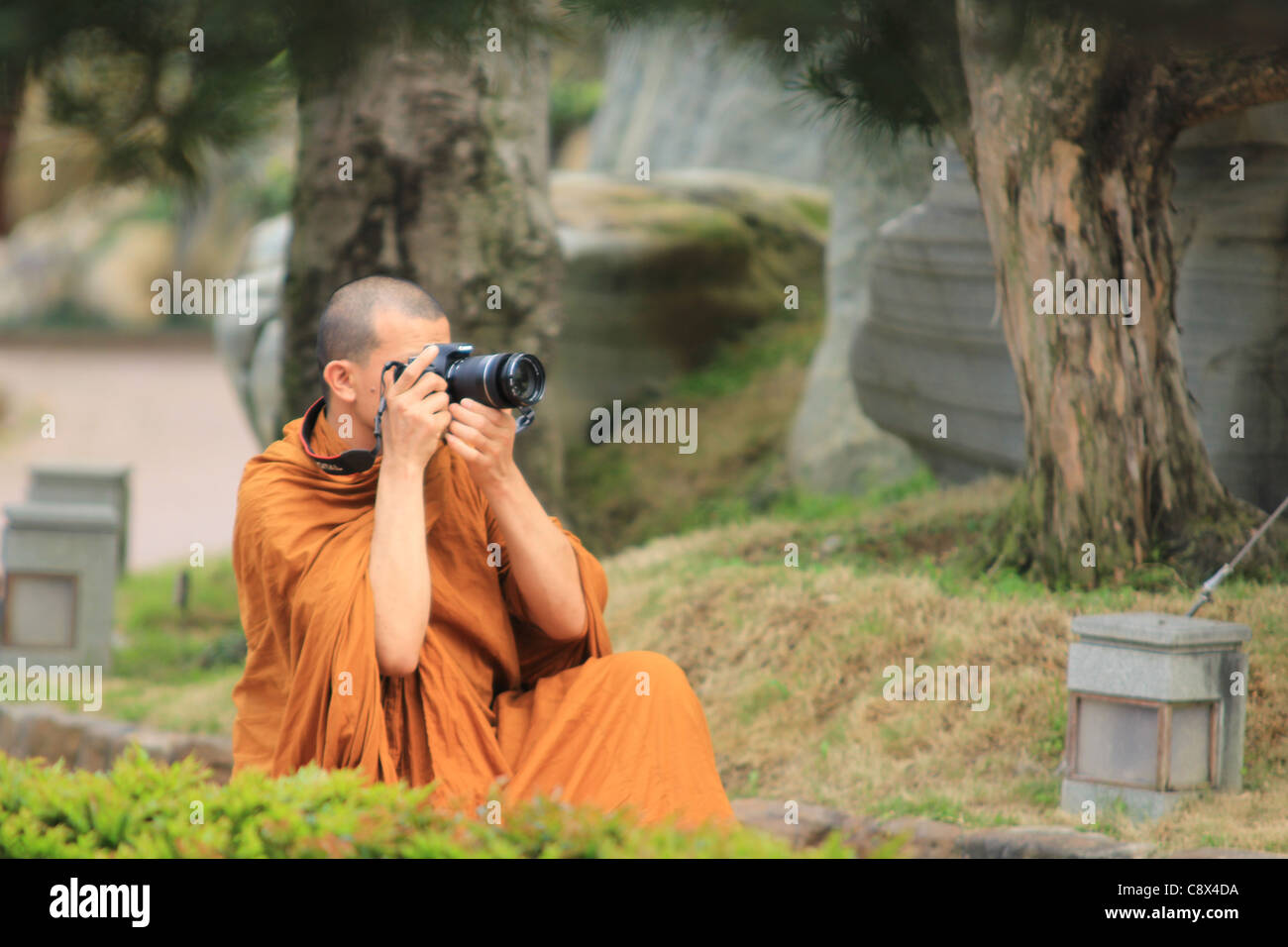 Monk and camera hi-res stock photography and images - Alamy