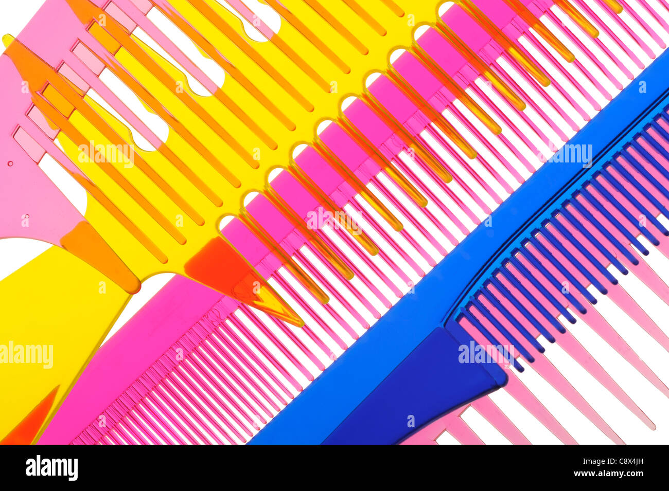 Set multi-coloured transparent combs. It is photographed on a gleam. It ...