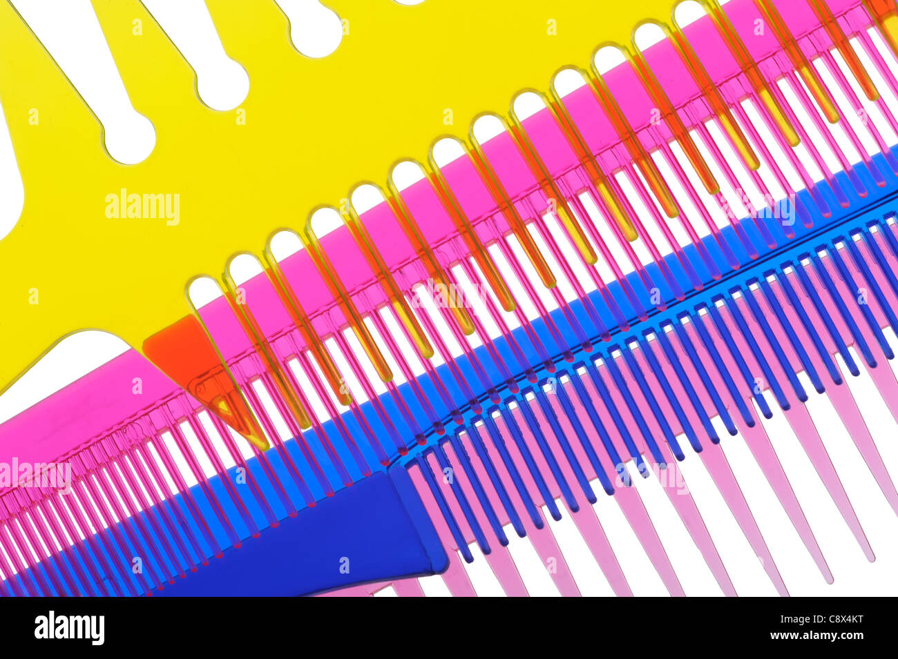 Set multi-coloured transparent combs. It is photographed on a gleam. It ...
