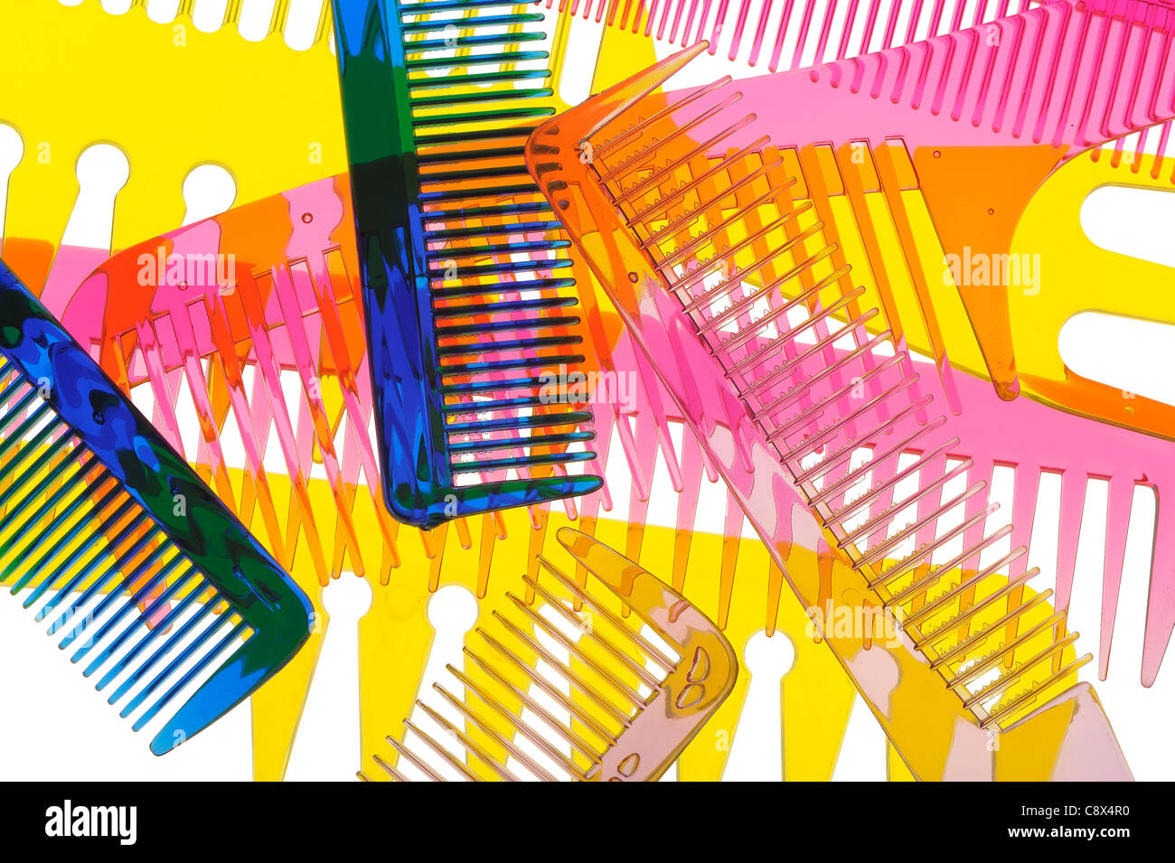 Set multi-coloured transparent combs. It is photographed on a gleam. It ...