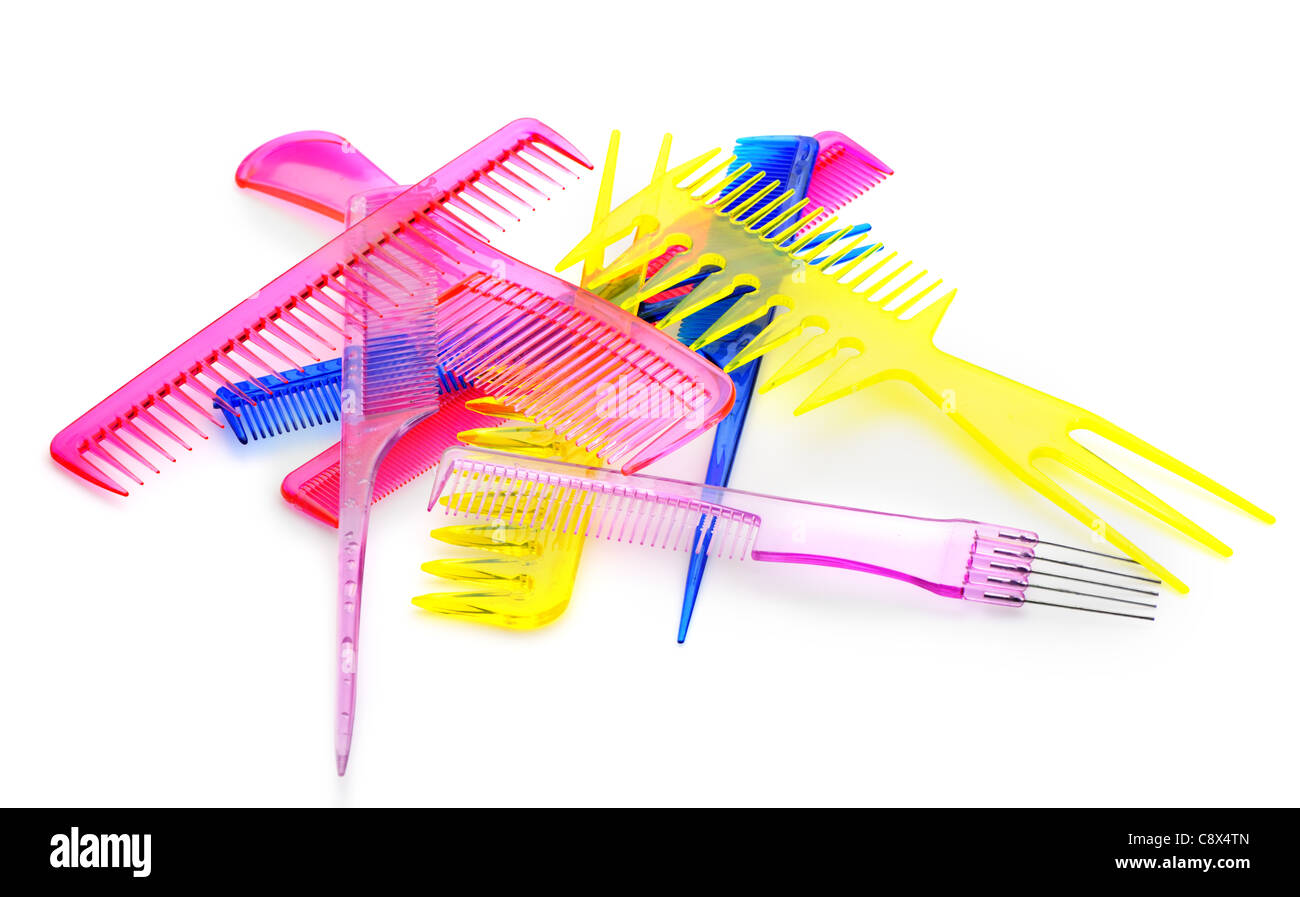 Set multi-coloured transparent combs. It is photographed on a gleam. It ...