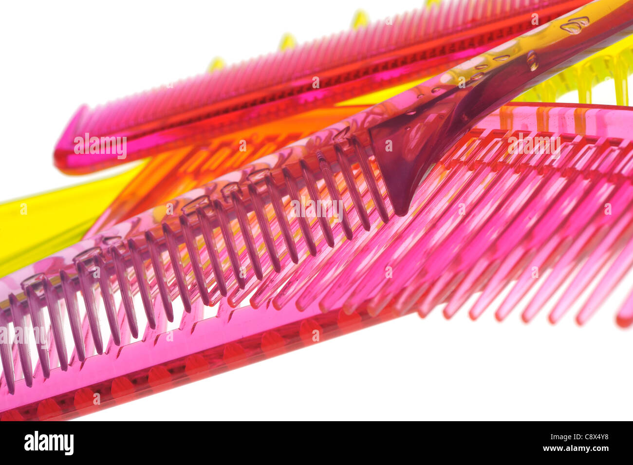 Set multi-coloured transparent combs. It is photographed on a gleam. It ...