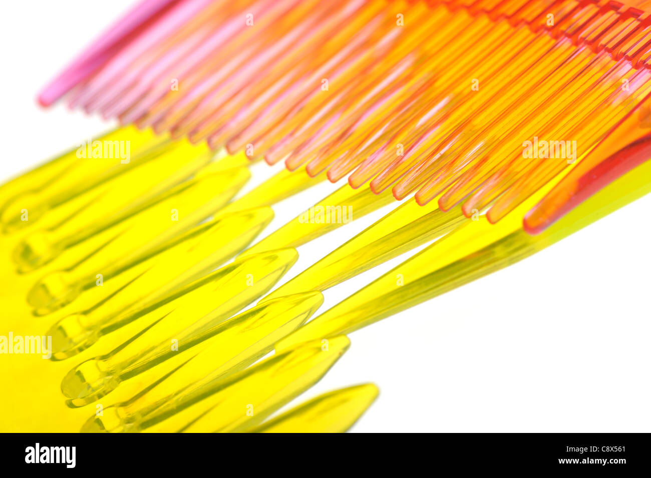 Set multi-coloured transparent combs. It is photographed on a gleam. It ...