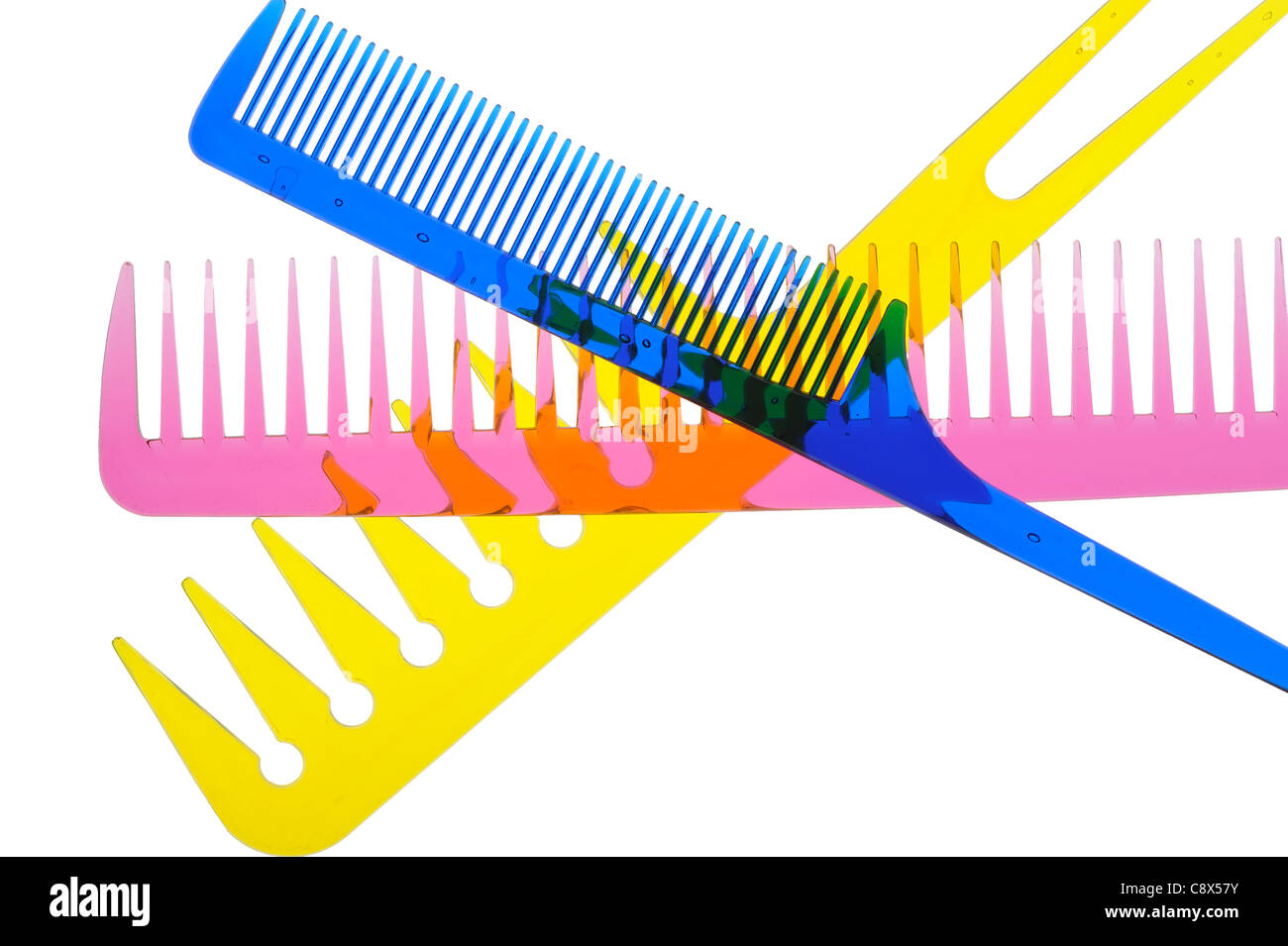 Set multi-coloured transparent combs. It is photographed on a gleam. It ...