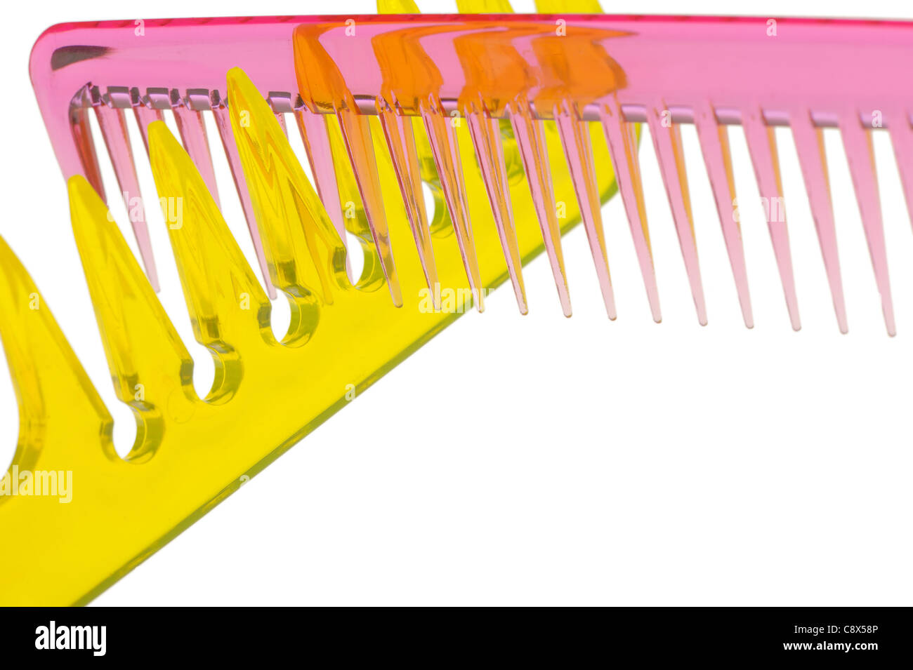 Set multi-coloured transparent combs. It is photographed on a gleam. It ...