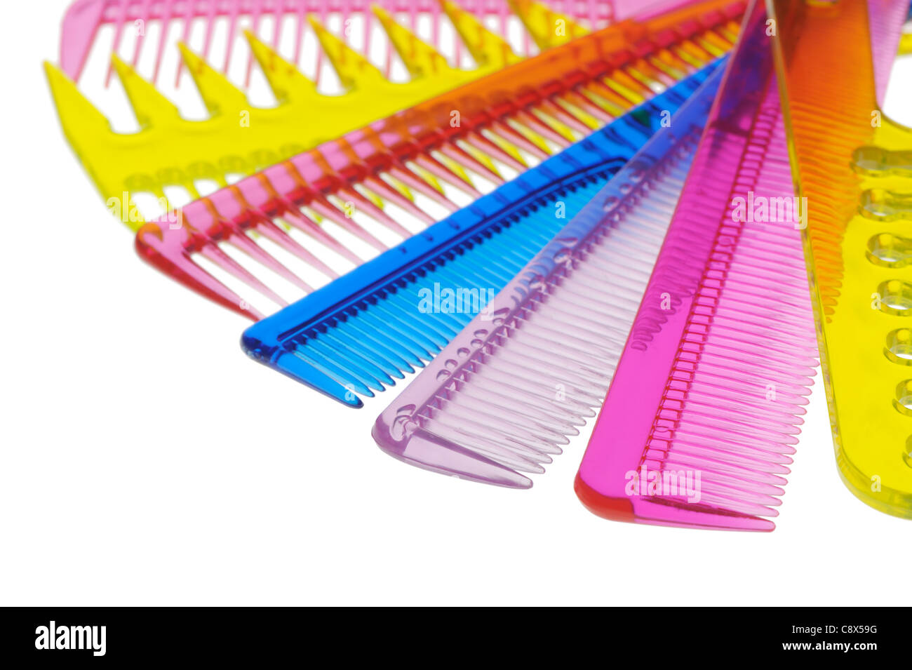 Set multi-coloured transparent combs. It is photographed on a gleam. It ...