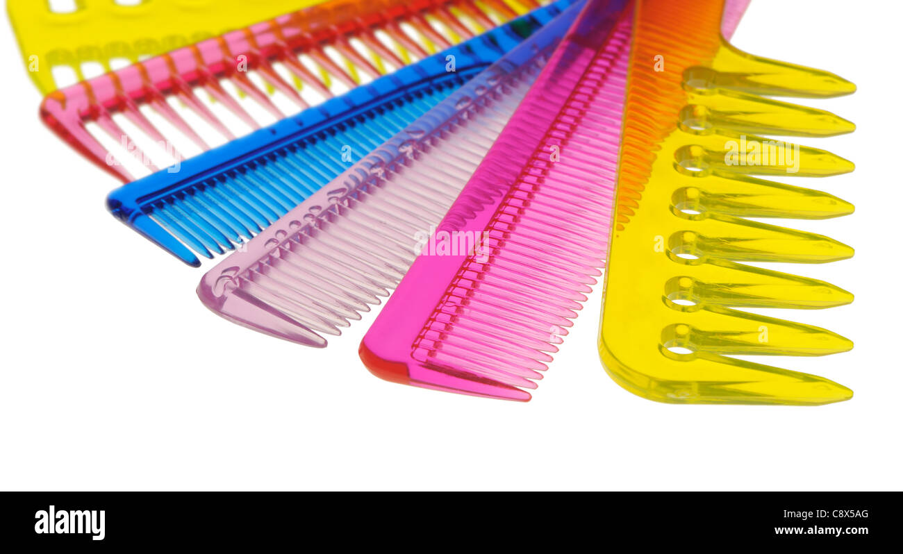 Set multi-coloured transparent combs. It is photographed on a gleam. It ...