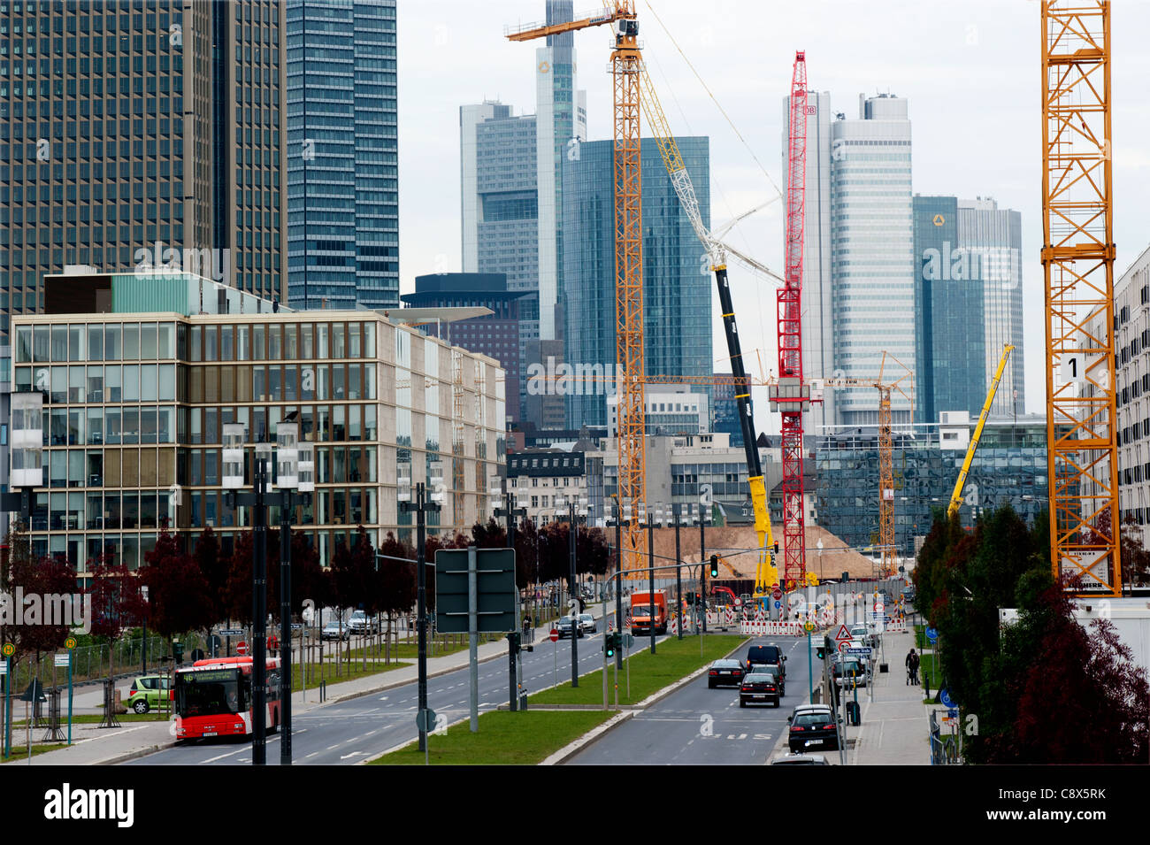 Building site, high-rise buildings with construction cranes in ...