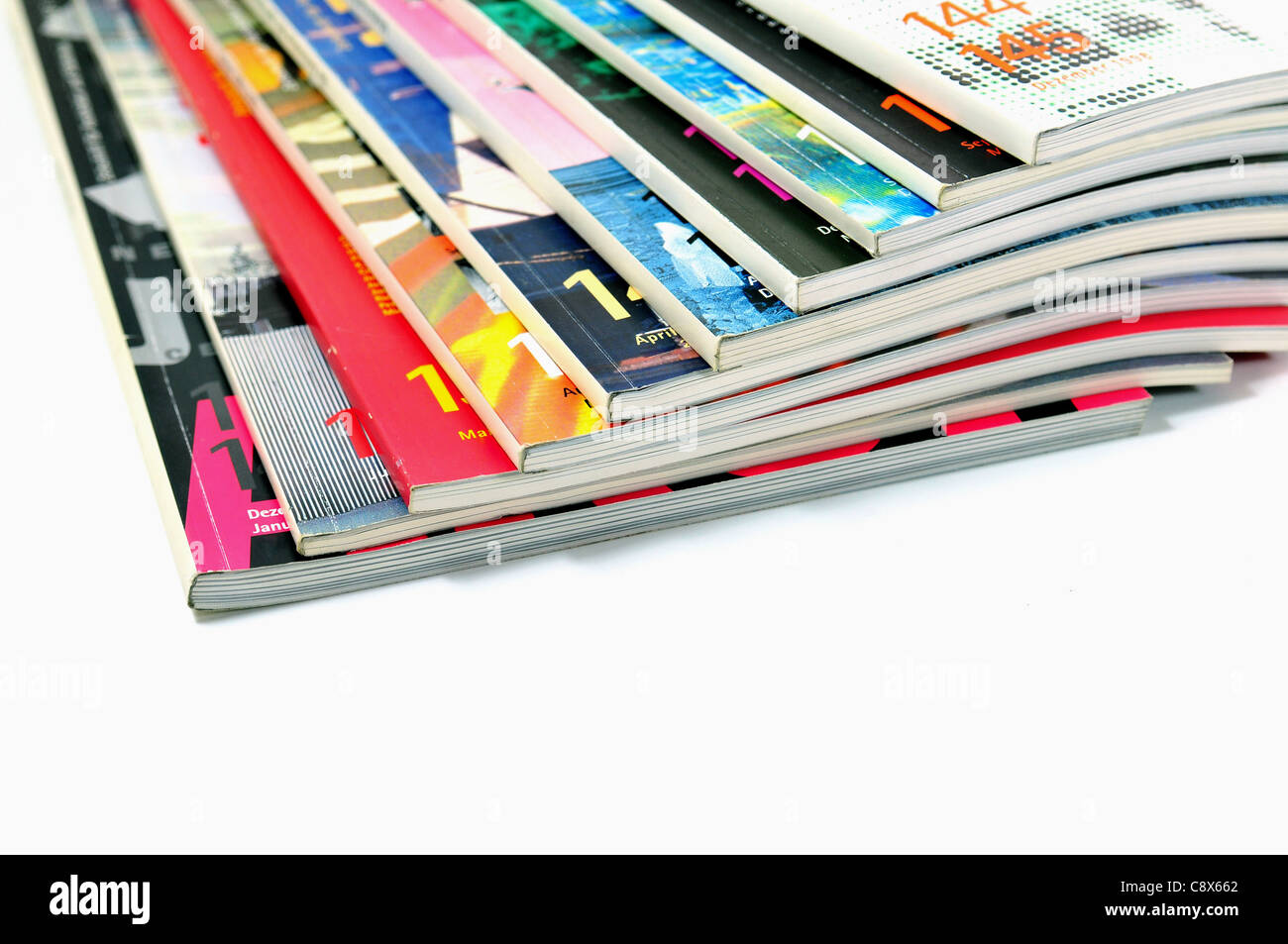 Pile of various multicolored magazines on white background Stock Photo ...