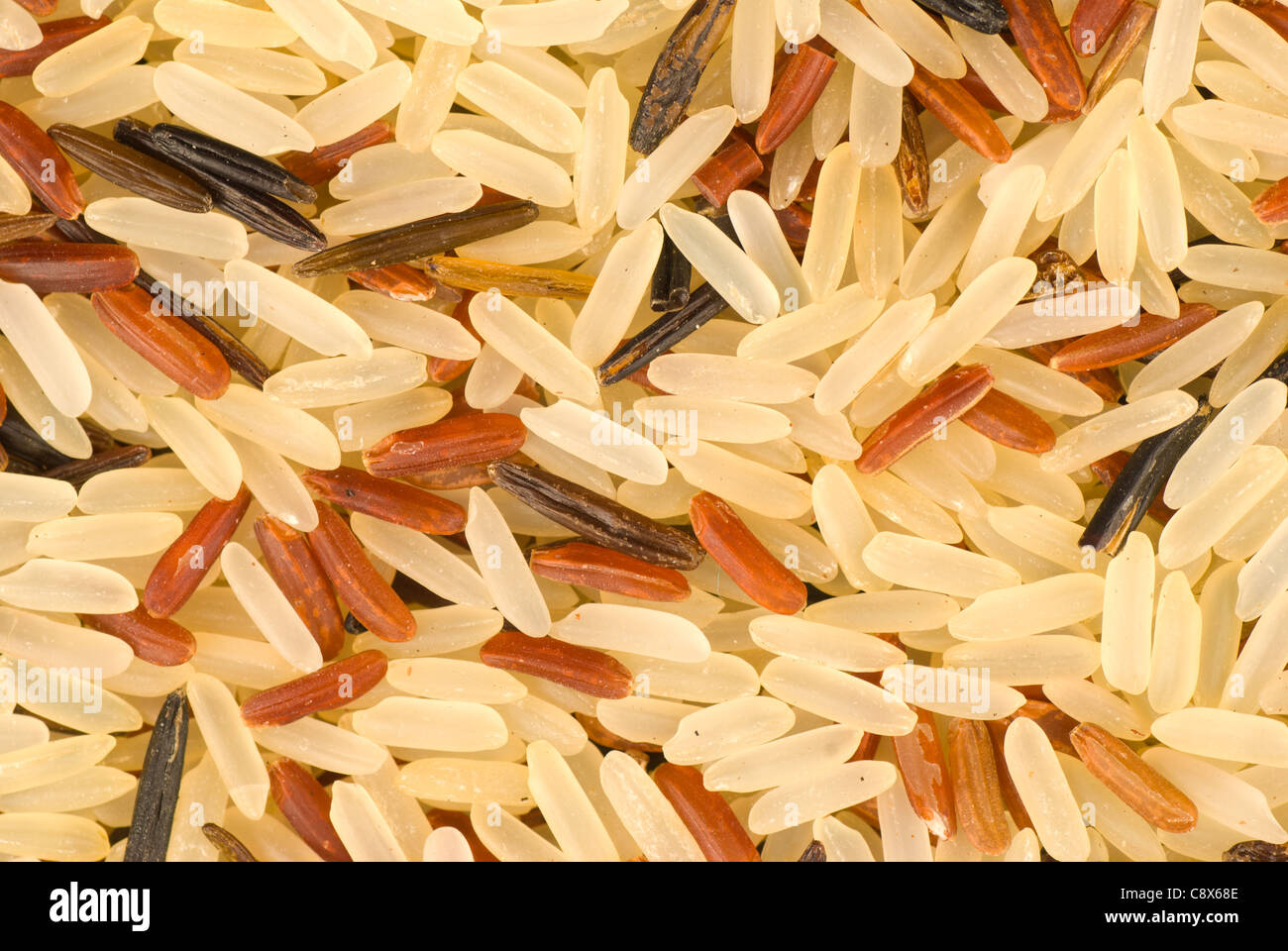 Assorted raw rice grains of three different types Stock Photo - Alamy