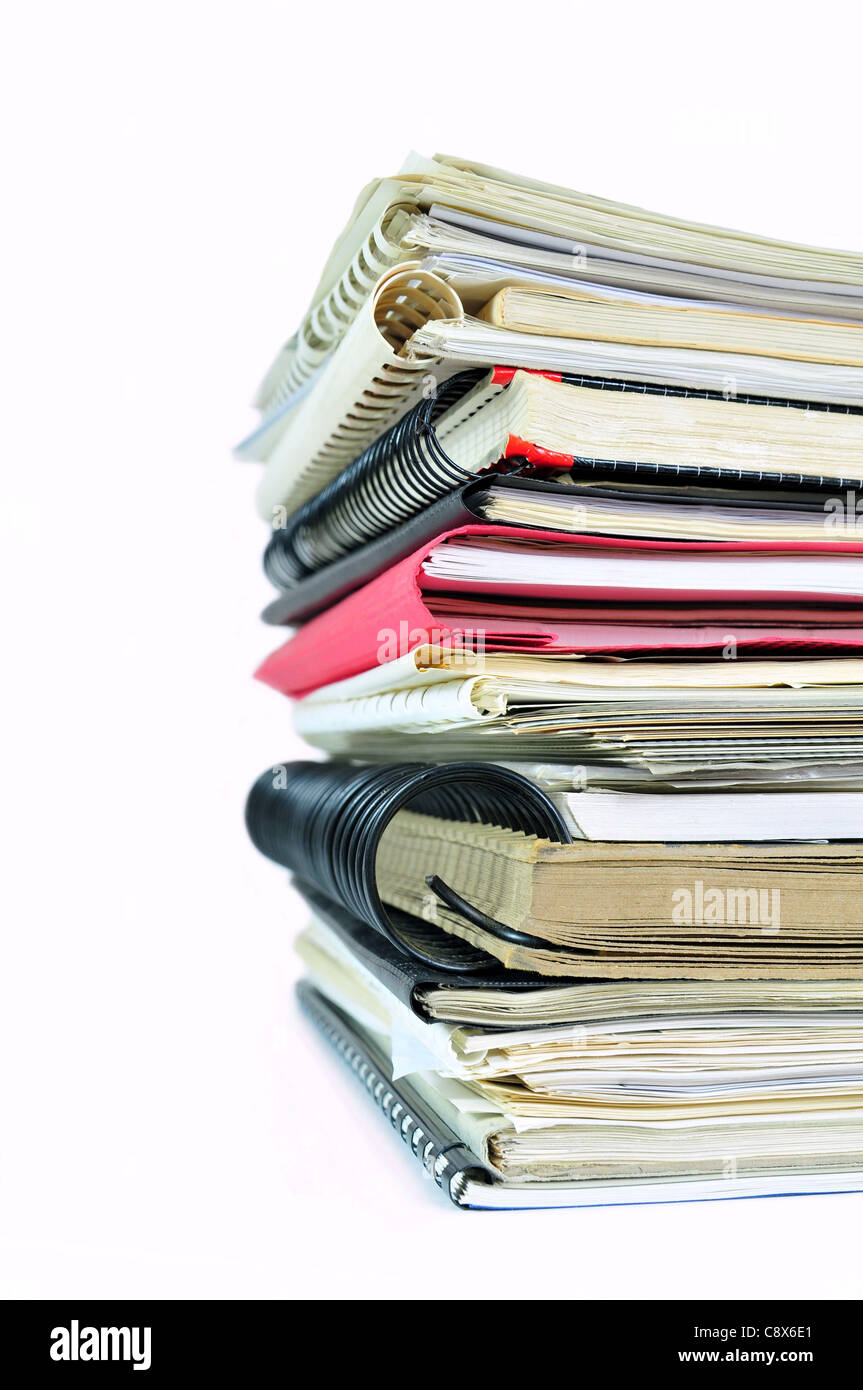Pile of office binder on white background Stock Photo - Alamy