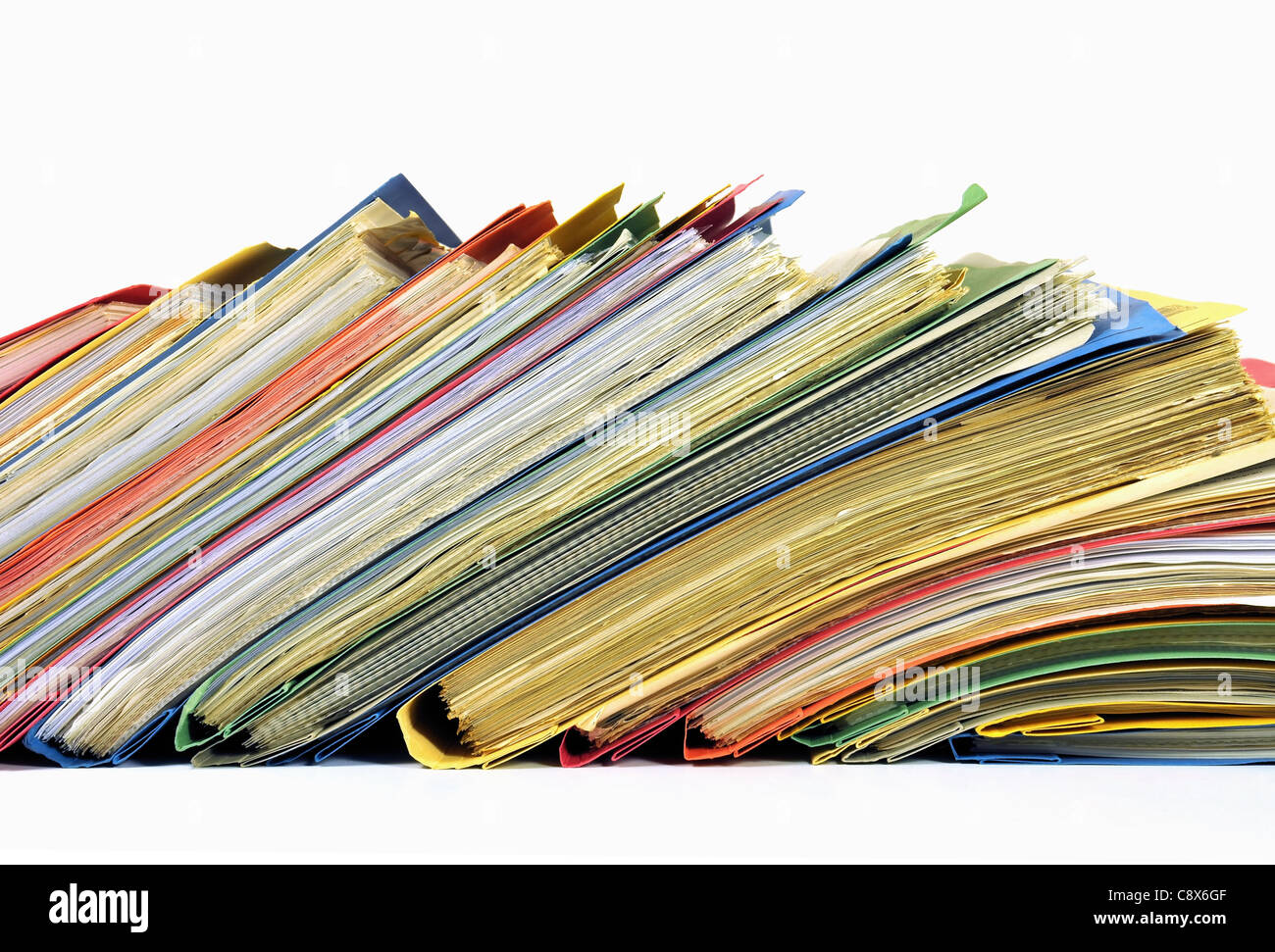 Pile of office binder on white background Stock Photo - Alamy