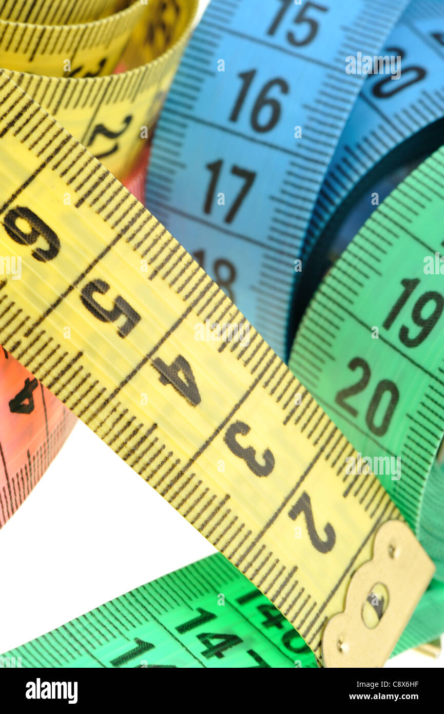 Measuring tape of the tailor. Abstract color background Stock Photo - Alamy
