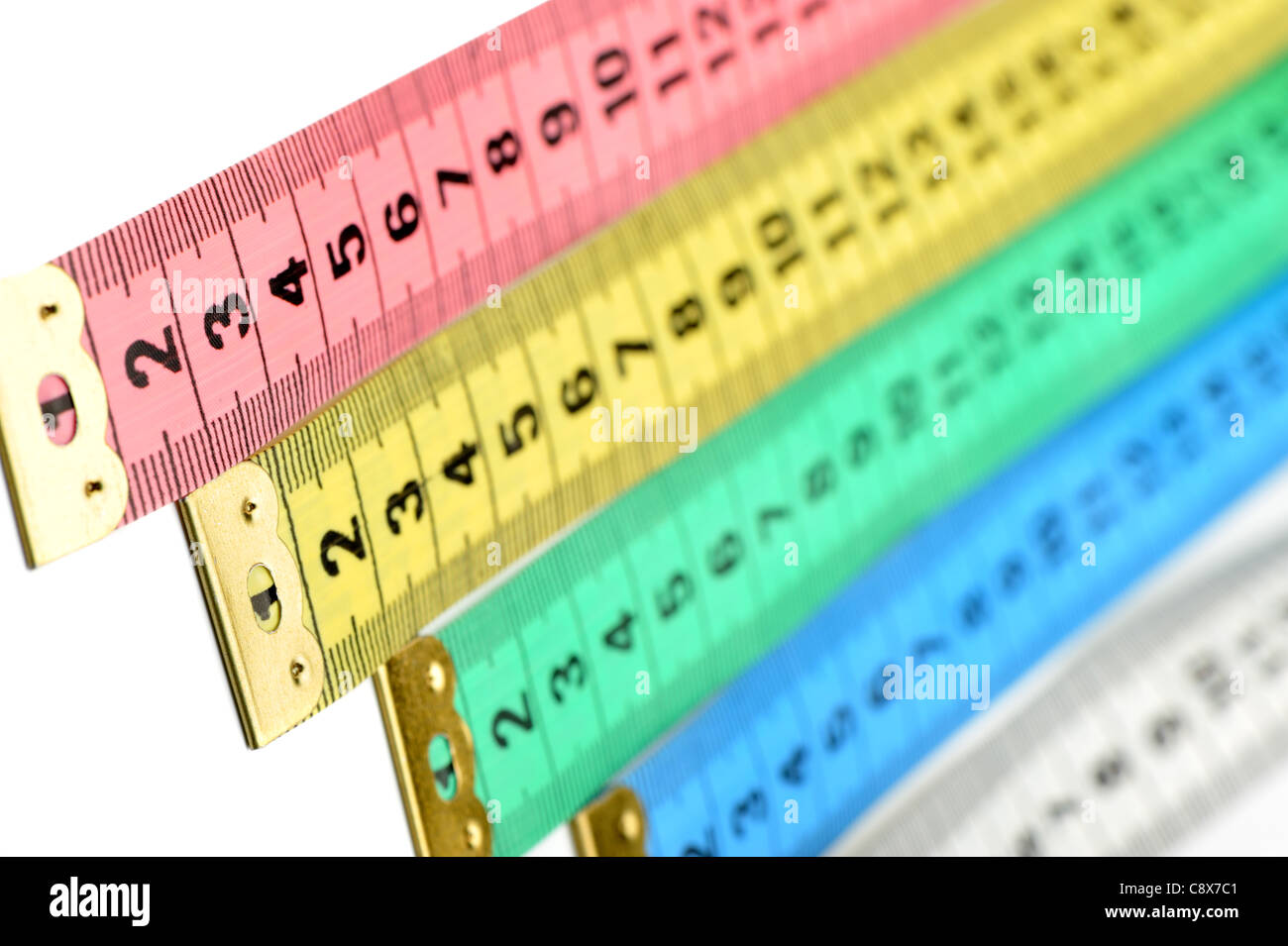 Measuring tape of the tailor. Abstract color background Stock Photo - Alamy