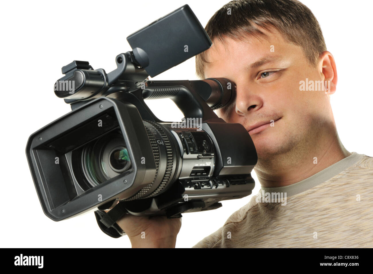The man with a videocamera. It is isolated on a white background Stock ...