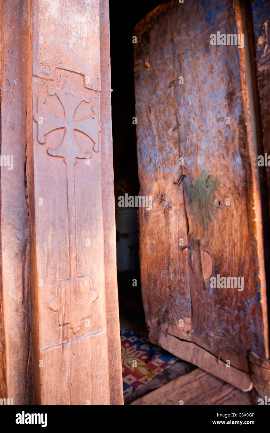 Original carved olive-wood door at the entrance to Abraha Atsbeha in ...