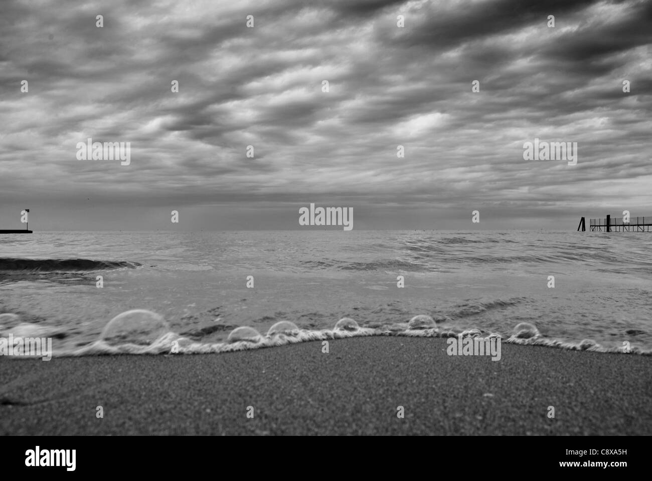 Bay on sandy beach Black and White Stock Photos & Images - Alamy