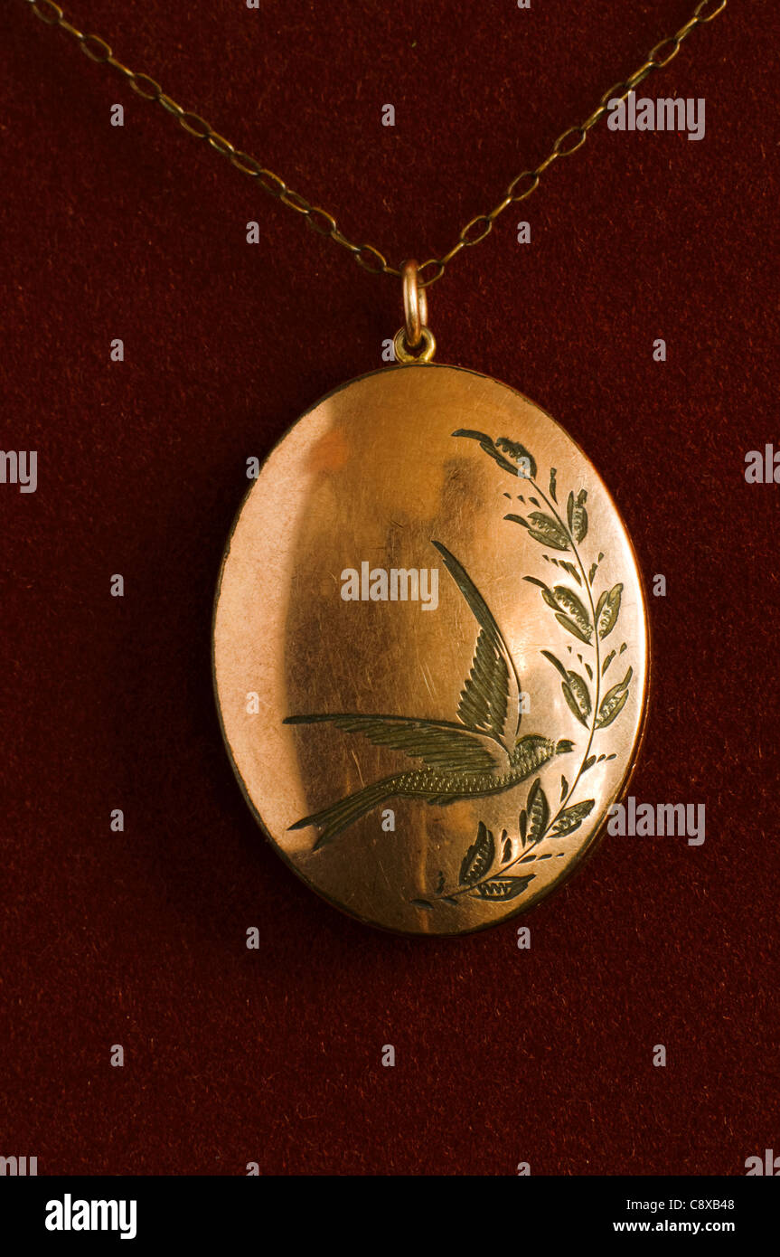 Gold locket hi-res stock photography and images - Alamy