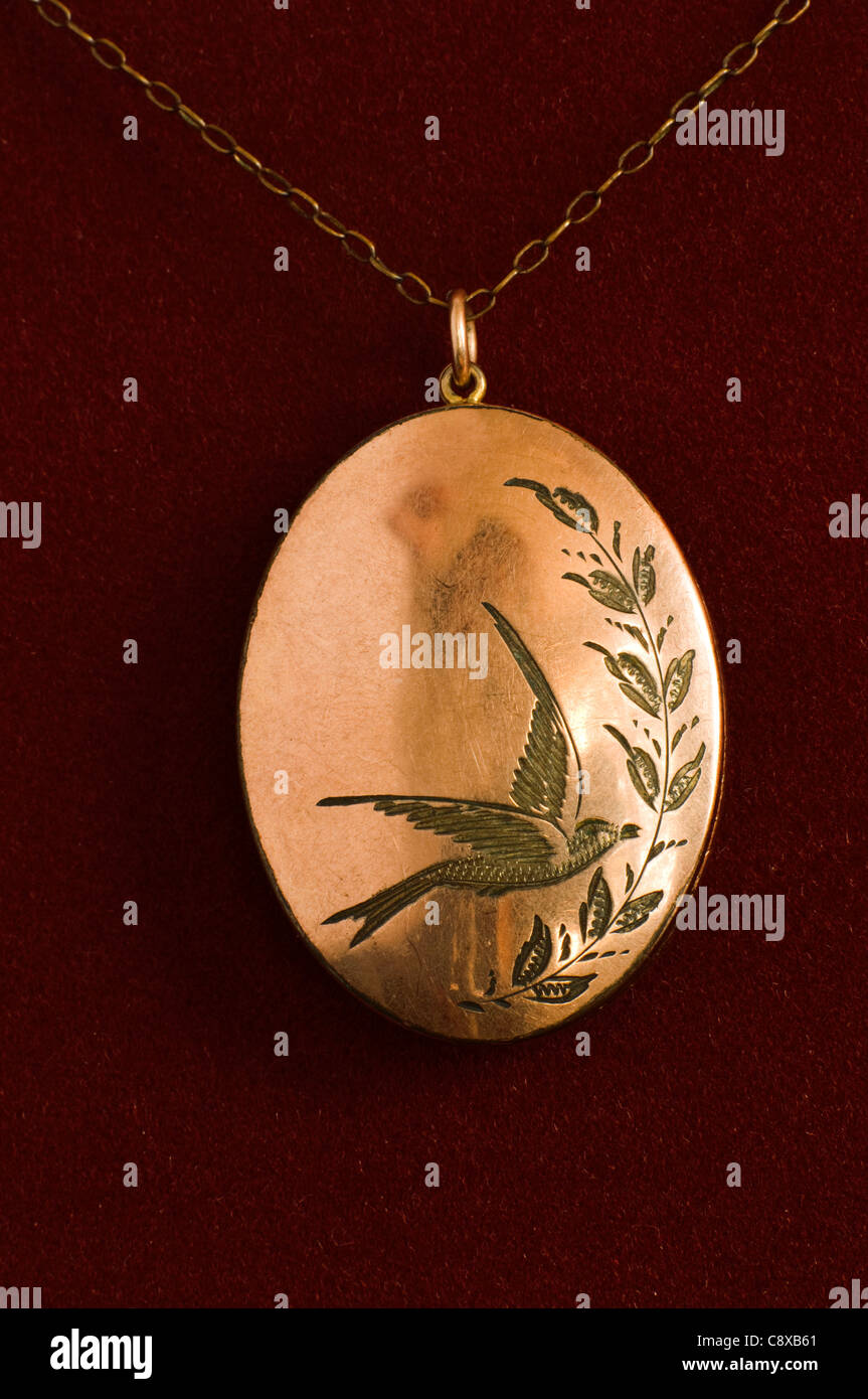 Gold locket hi-res stock photography and images - Alamy