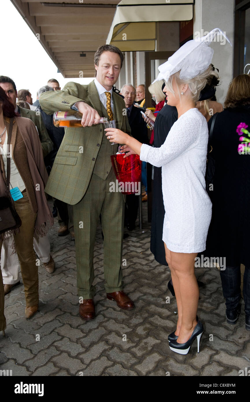 Young racegoers betting hi-res stock photography and images - Alamy