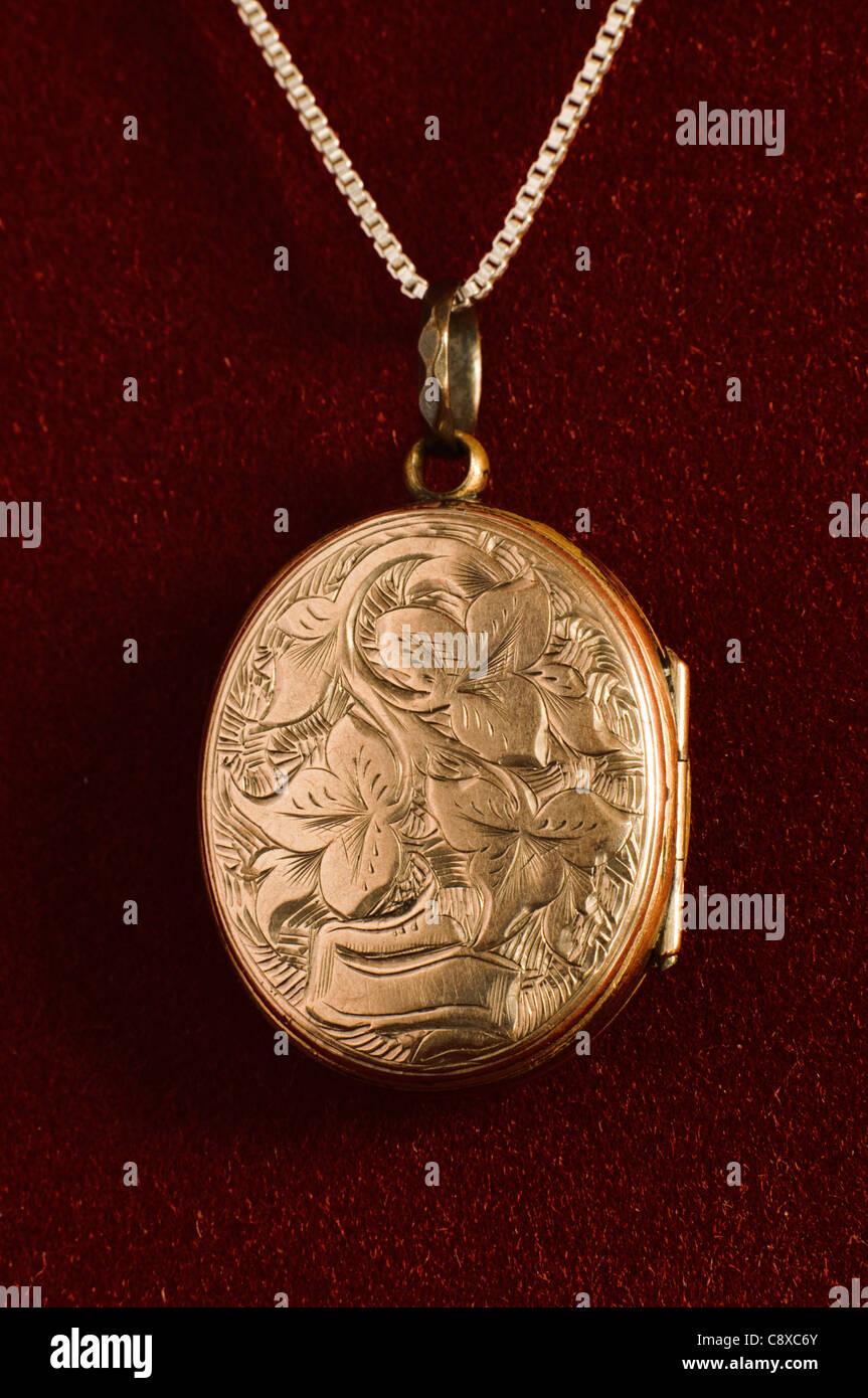 Gold locket hi-res stock photography and images - Alamy