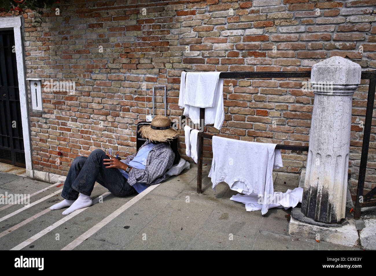Homeless washing hi-res stock photography and images - Alamy